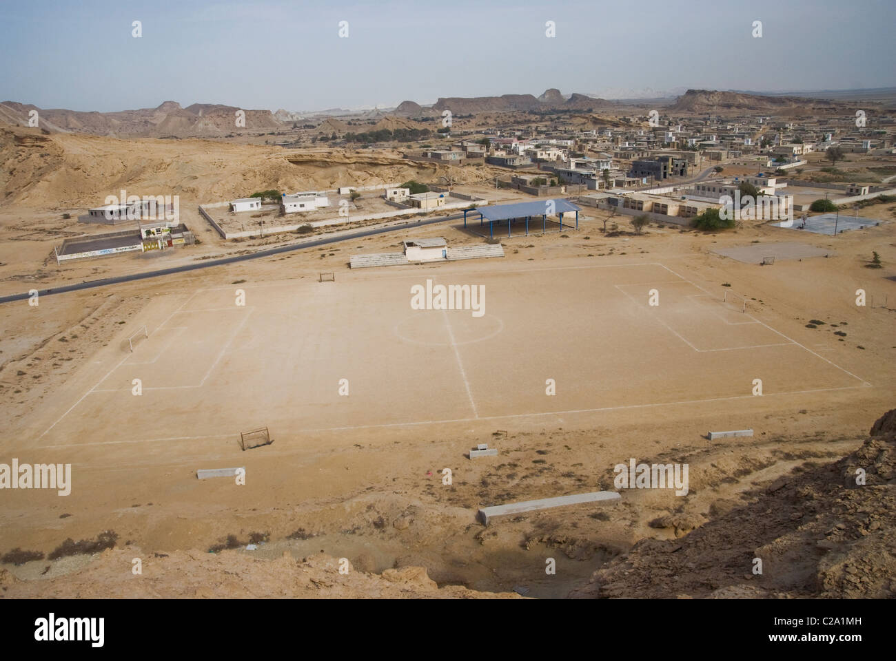 A sandy football ground Iranian island of Qeshm, Iran - 18.12.09 Stock ...