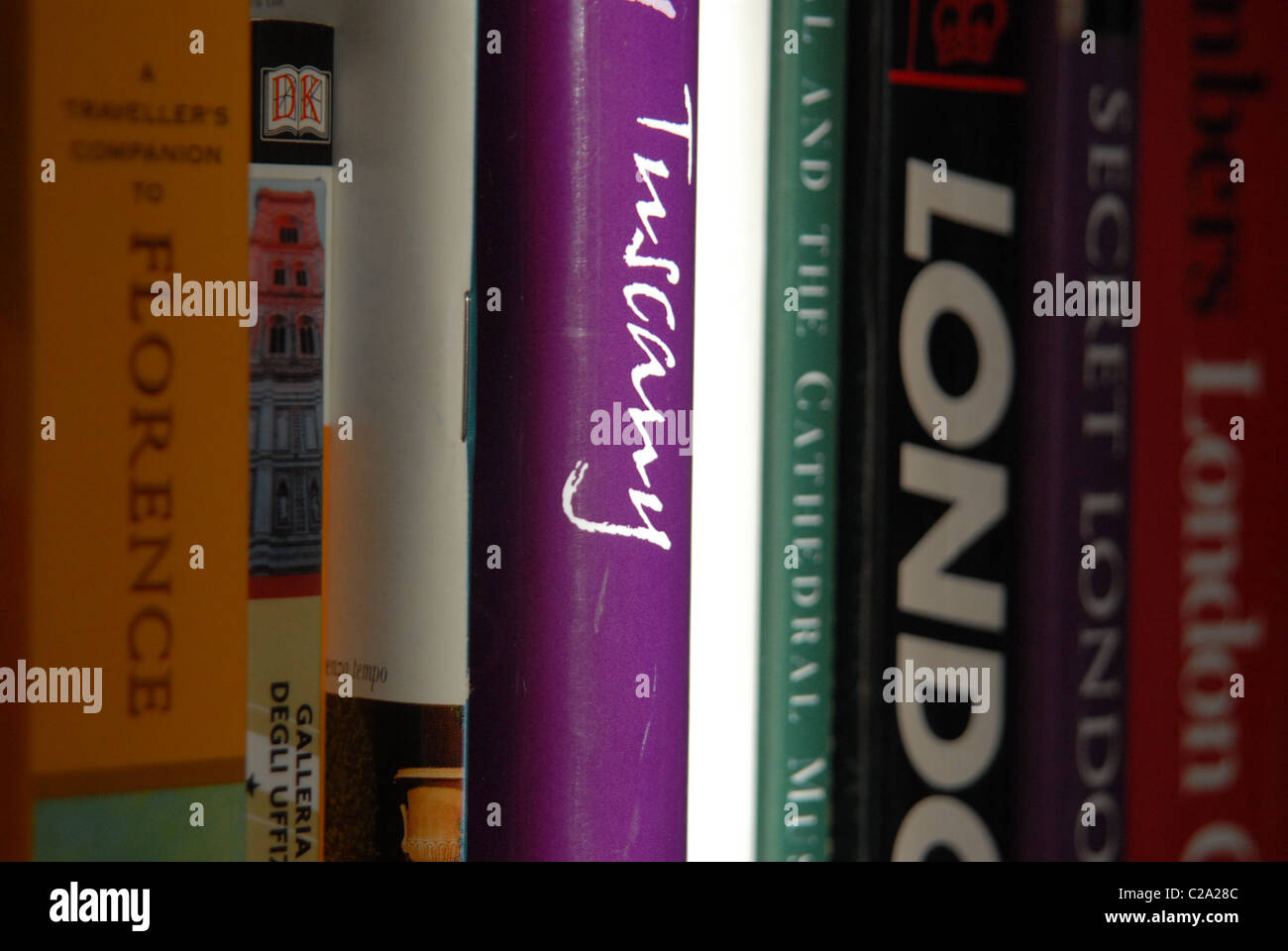 Travel books and guide books, book shelf Stock Photo - Alamy