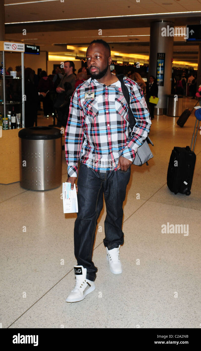 Wyclef Jean leaves Miami International Airport flying home to Haiti for ...