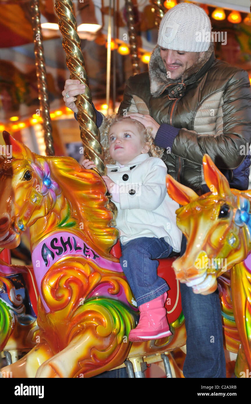 Peter Andre with Princess Tiaamii on the Merry-Go-Round at 'Winter ...
