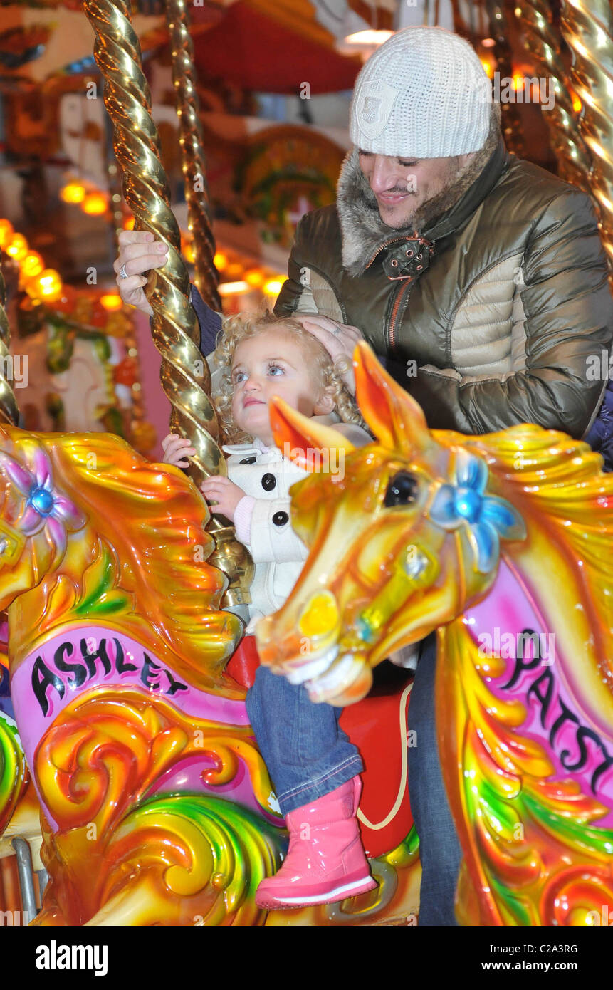 Peter Andre with Princess Tiaamii on the Merry-Go-Round at 'Winter ...