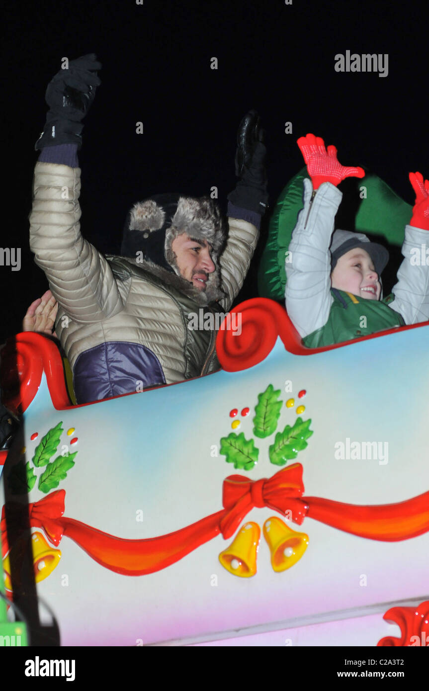 Peter Andre with Junior and Princess Tiaamii on a funfair ride at ...