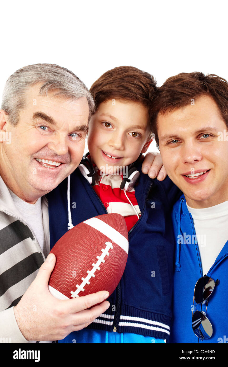 Happy family of three men smiling at camera Stock Photo - Alamy