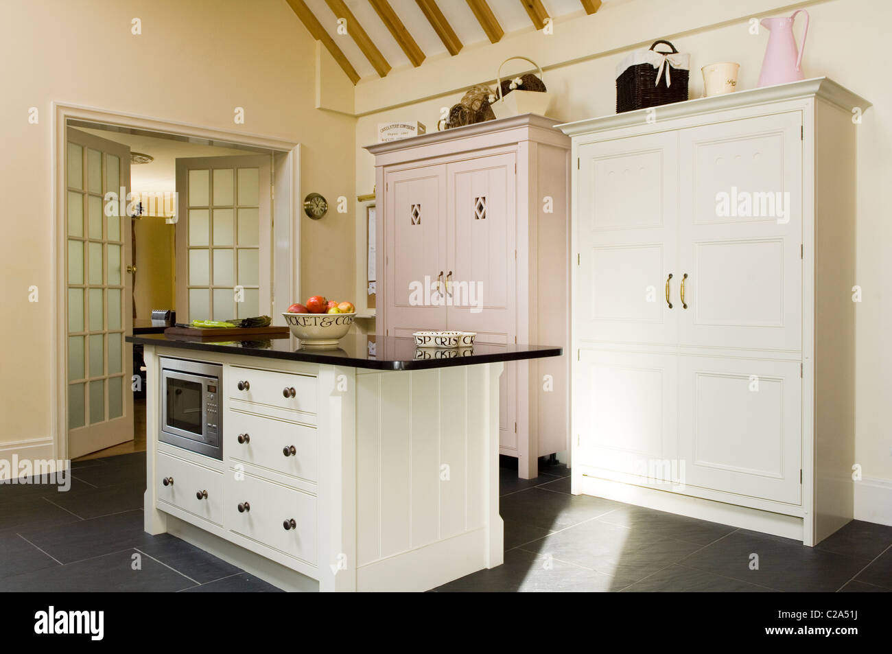 Kitchen interior designed and fitted by Robinson & Cornish Stock Photo ...