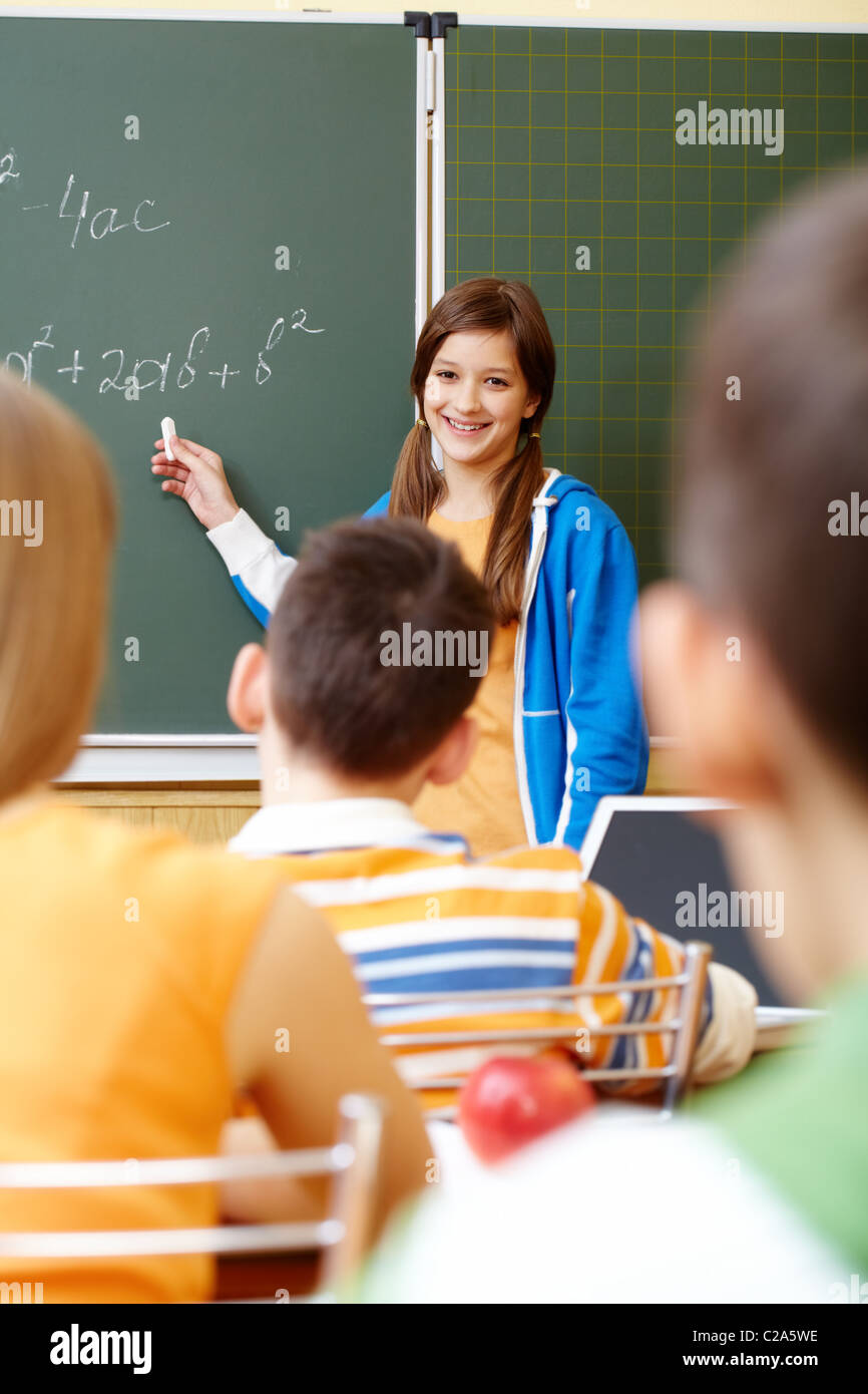 Confident student looking at camera in classroom Stock Photo - Alamy