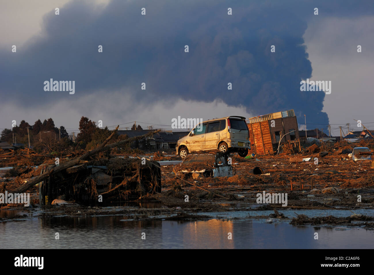 Swept cars on the debris after the great earthquake and tsunami hit the ...
