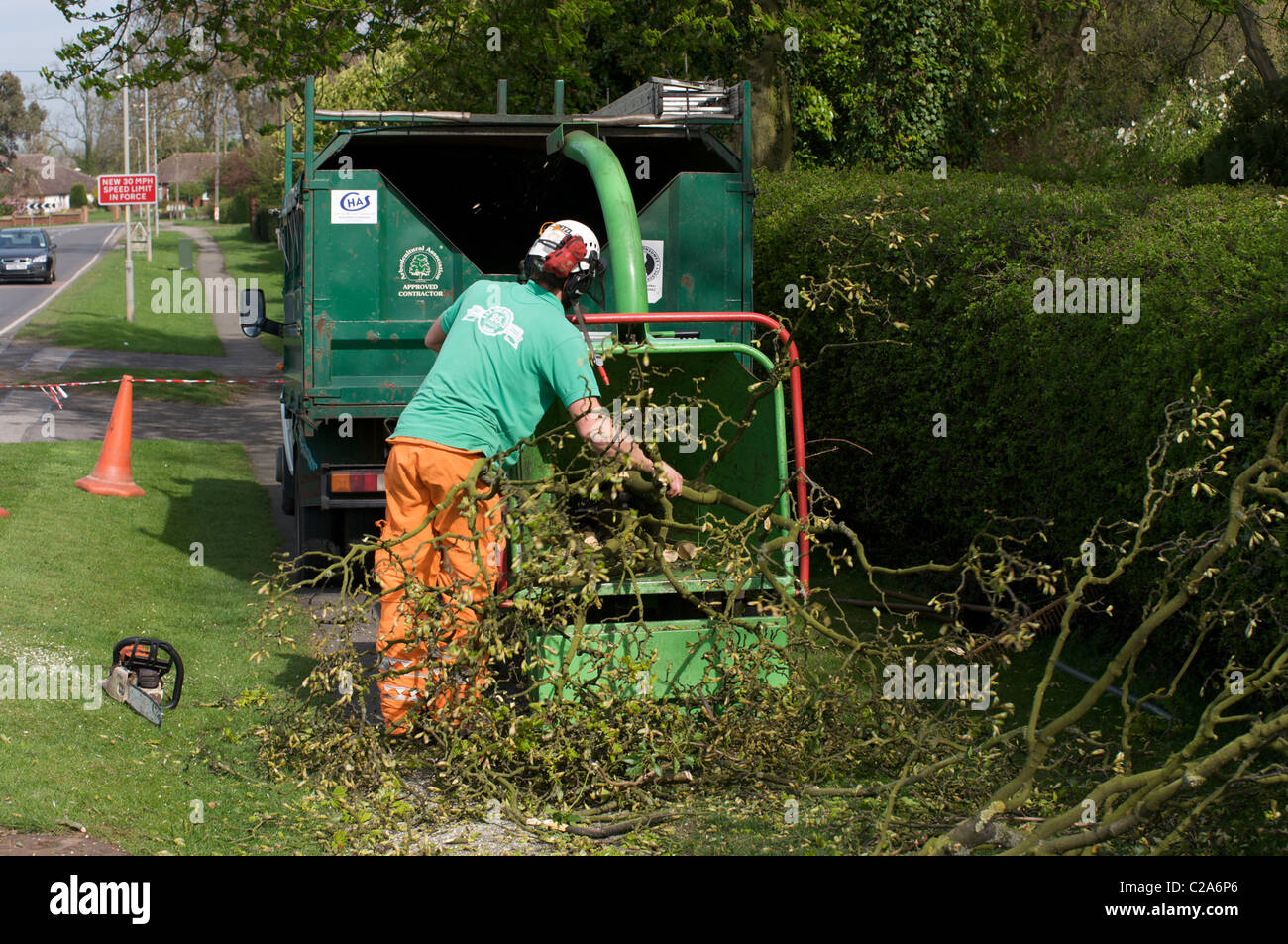 Feeding into machine hi-res stock photography and images - Alamy