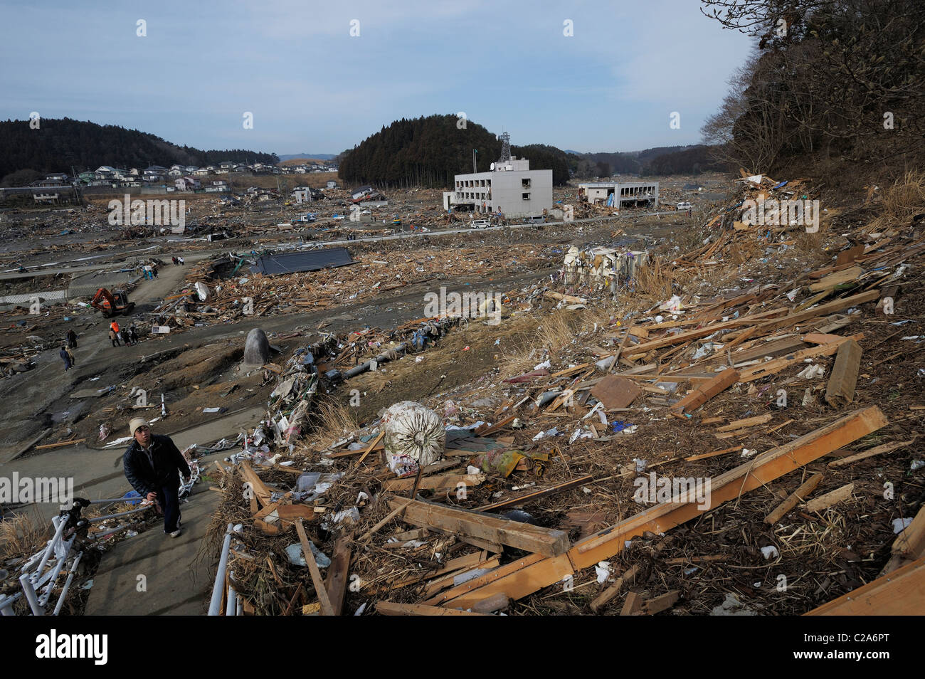 Tsunami left a lot of debris even at the hillside. Whole town was swept ...
