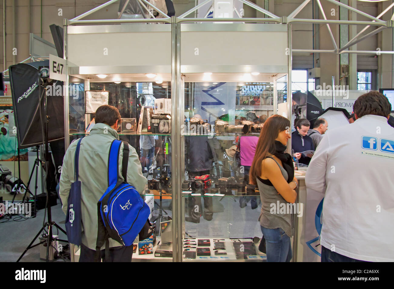 MILANO, ITALY - MARCH 27: People trying lenses in Canon stand at ...