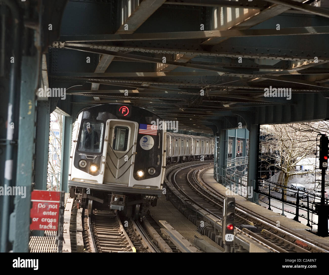 F train entering the West 8th St. Station in Brooklyn on its way to ...