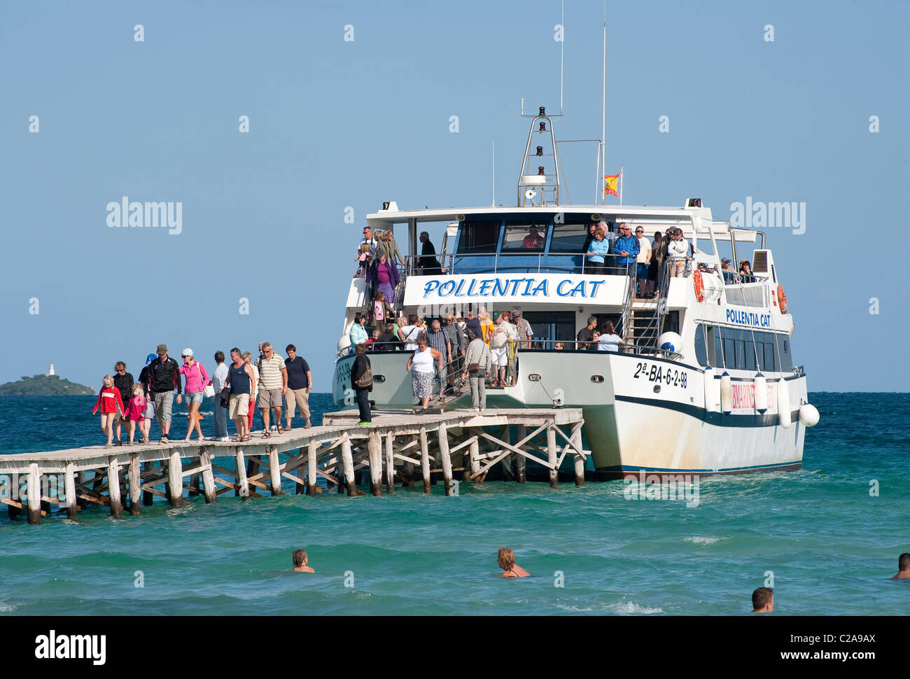Holidaymakers aboard the glass bottomed Pollentia Cat enjoying a boat ...