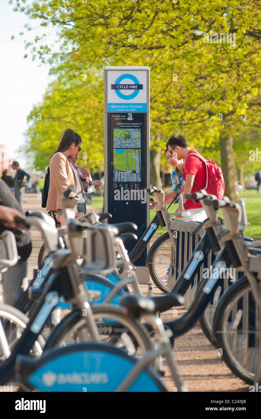 People using the London Rent a Bike scheme, in Kensington Gardens ...