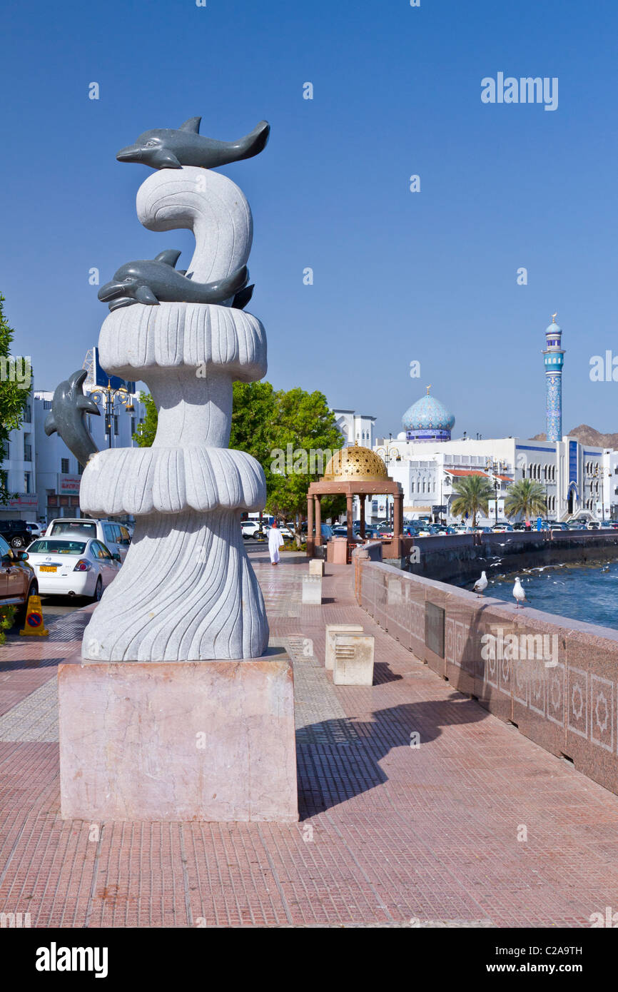 Aquatic dolphin sculptures on the Corniche promenade in Muscat, Oman ...