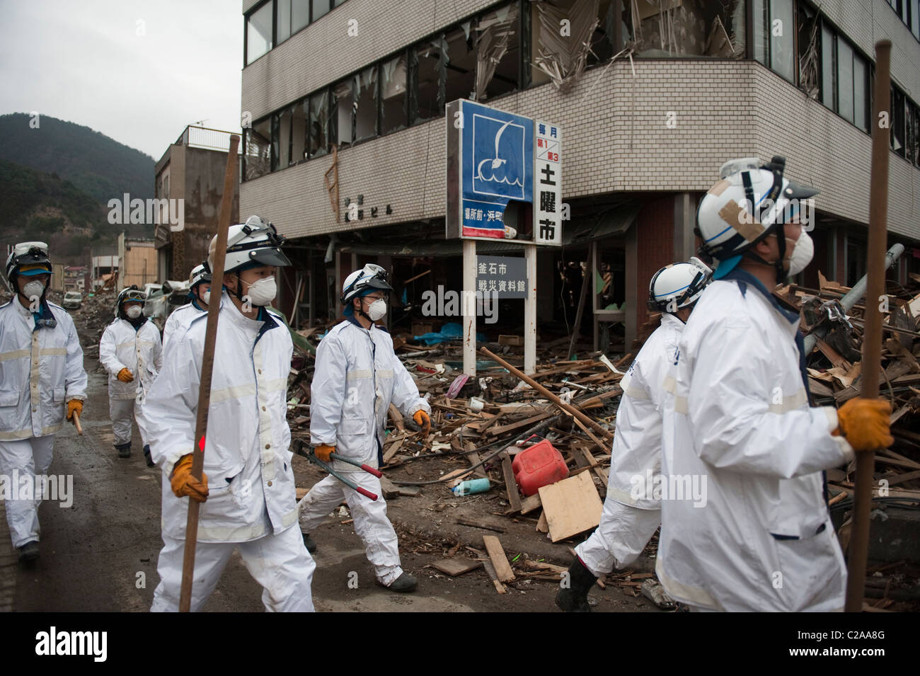 Government search teams look for survivors after a 9.0 Mw earthquake ...
