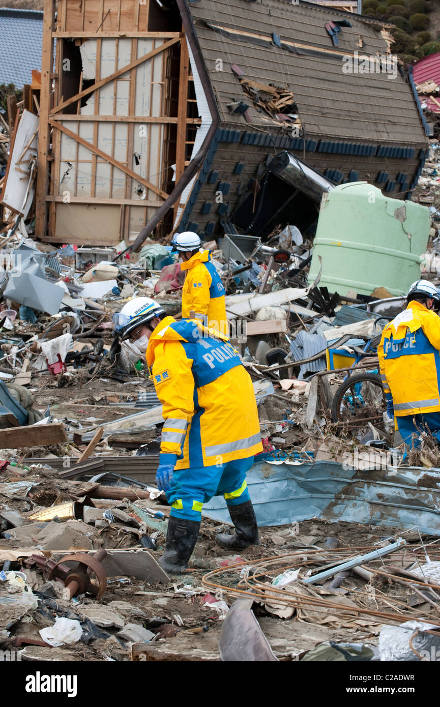 Japanese search and rescue teams search for survivors after thousands ...