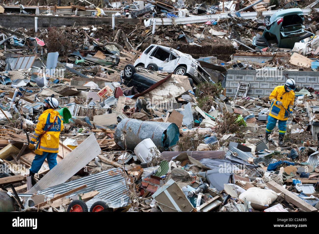 Japanese search and rescue teams search for survivors after thousands ...