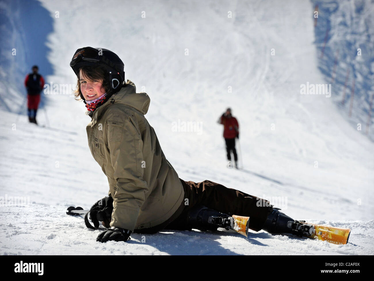 A boy rests after a skiing fall at the Vogel Ski Centre on the the Sija ...