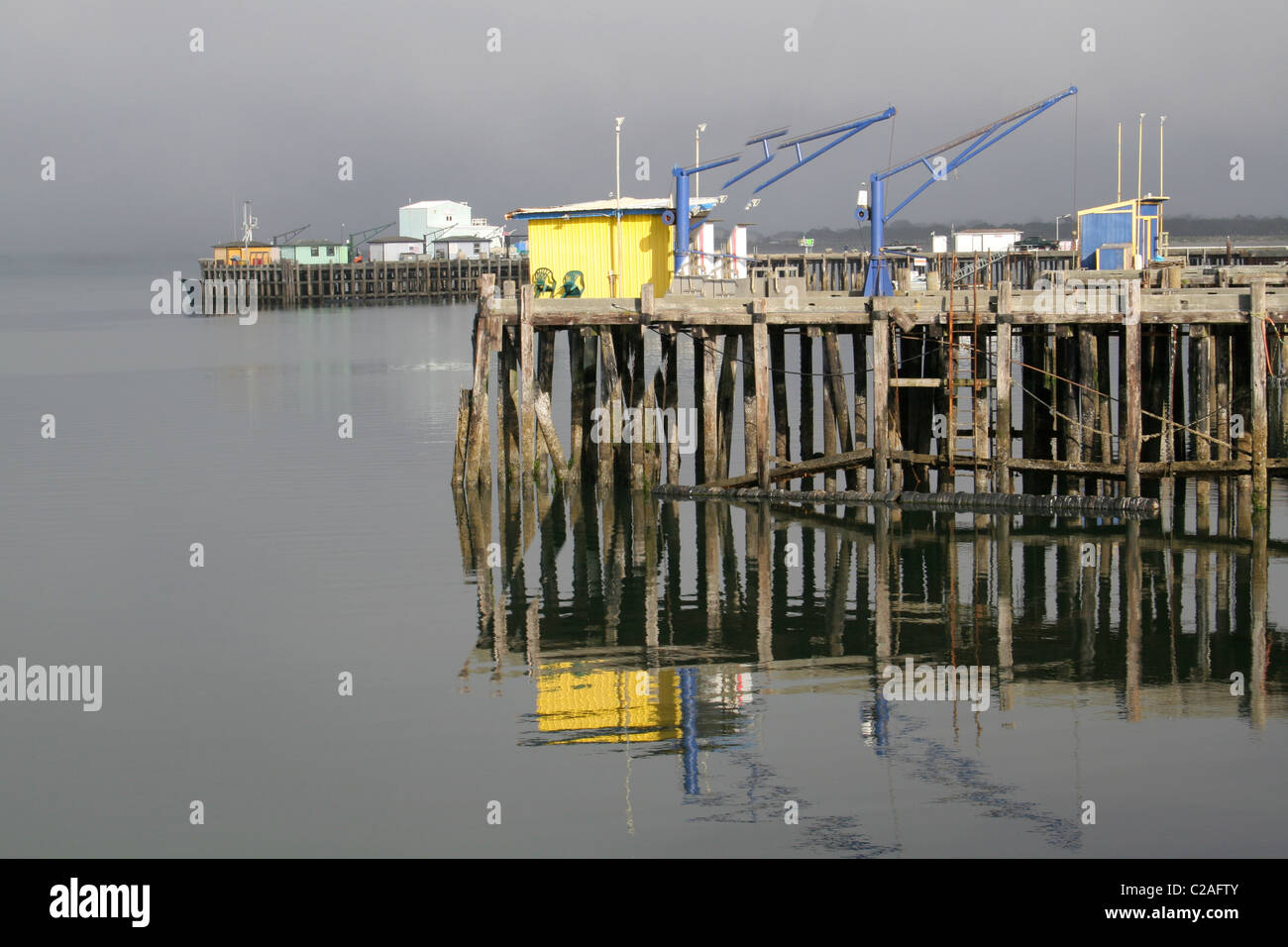 Colorful dock buildings in harbor Crescent City California Stock Photo ...