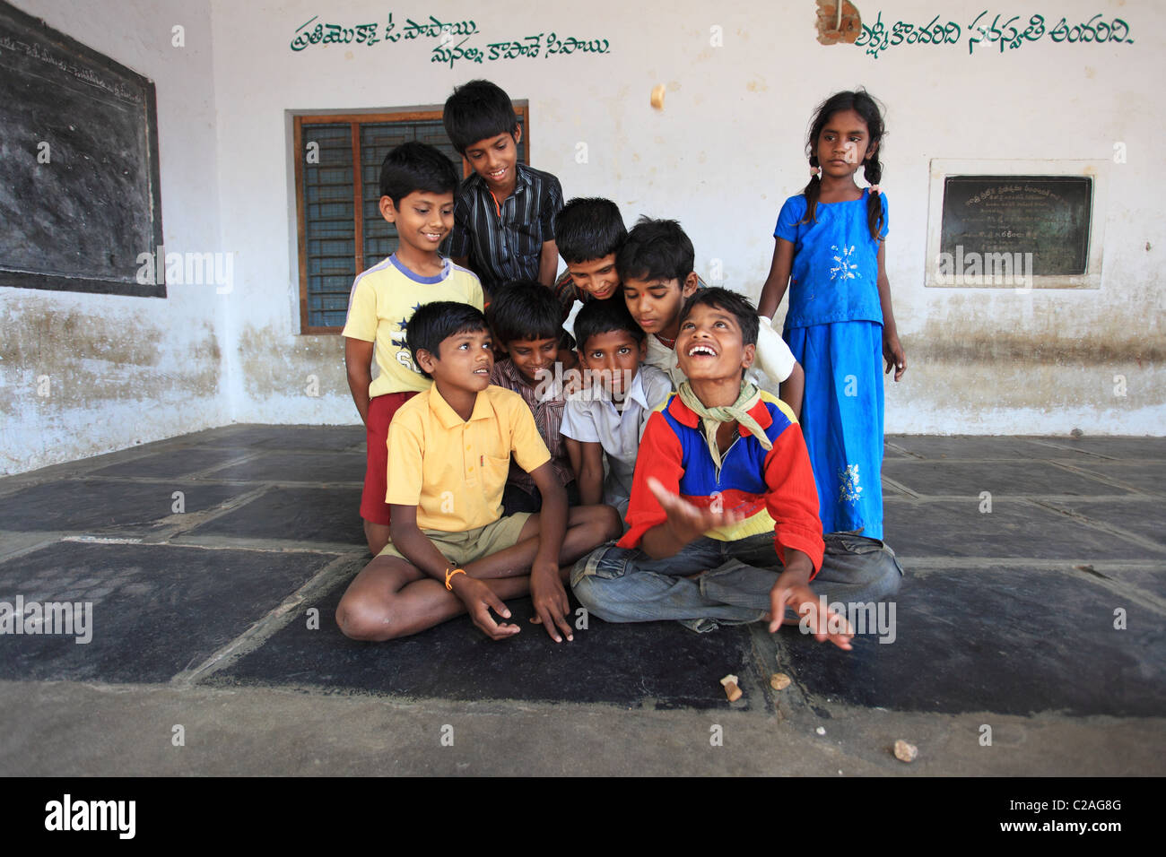 Children with stones hi-res stock photography and images - Alamy
