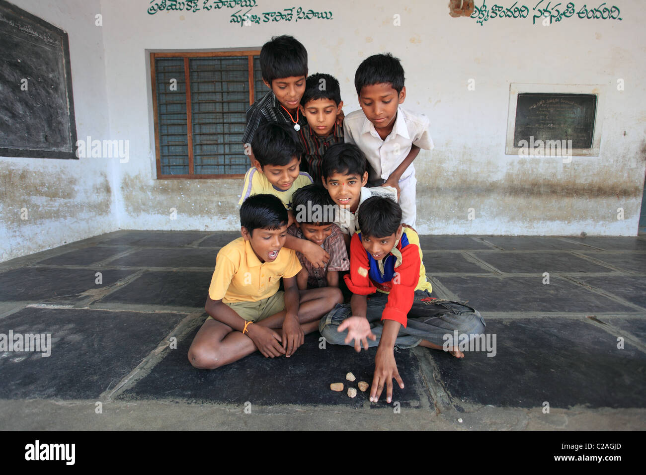 Children With Stones High Resolution Stock Photography and Images - Alamy