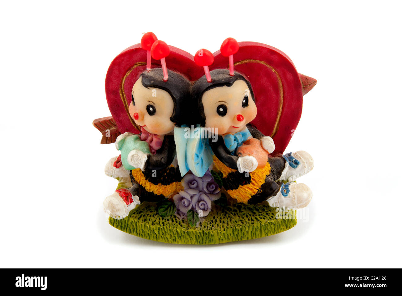 Old two ants figure on white background Stock Photo - Alamy