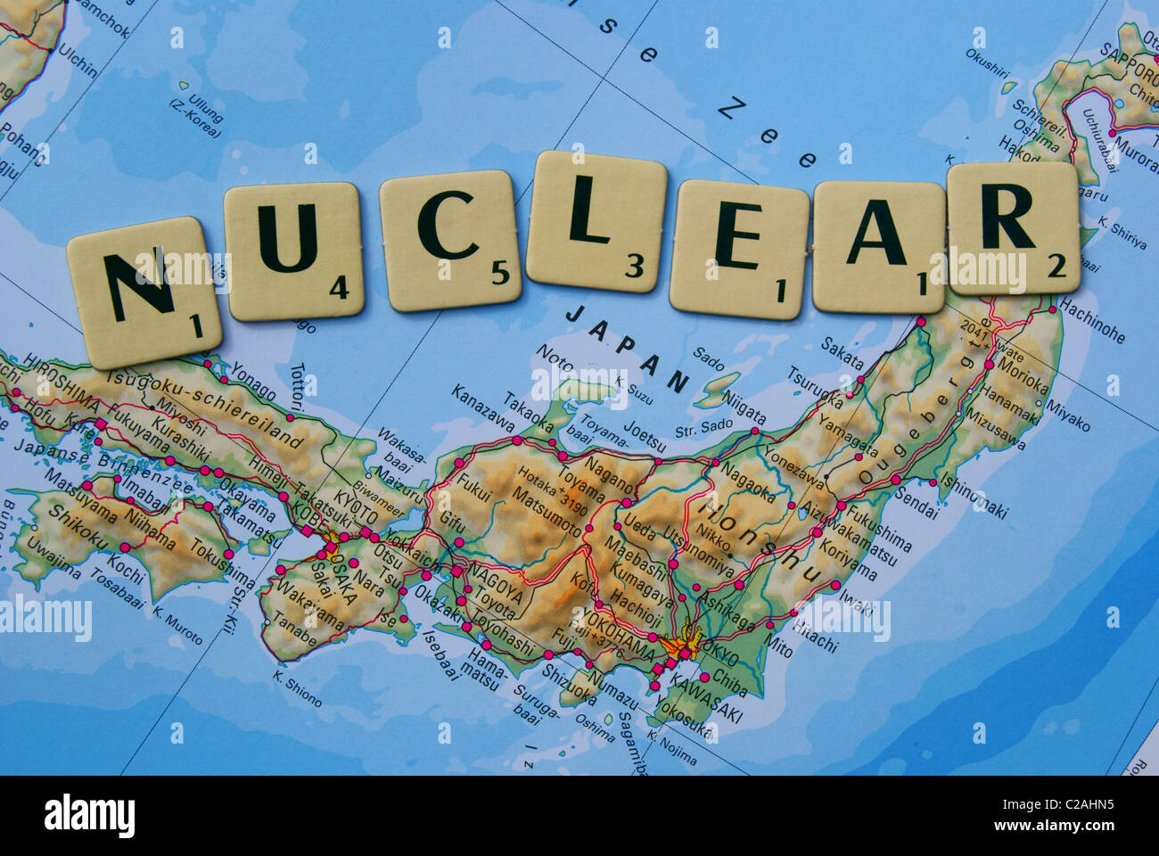 Nuclear spelled on a map of Japan (scrabble Stock Photo - Alamy