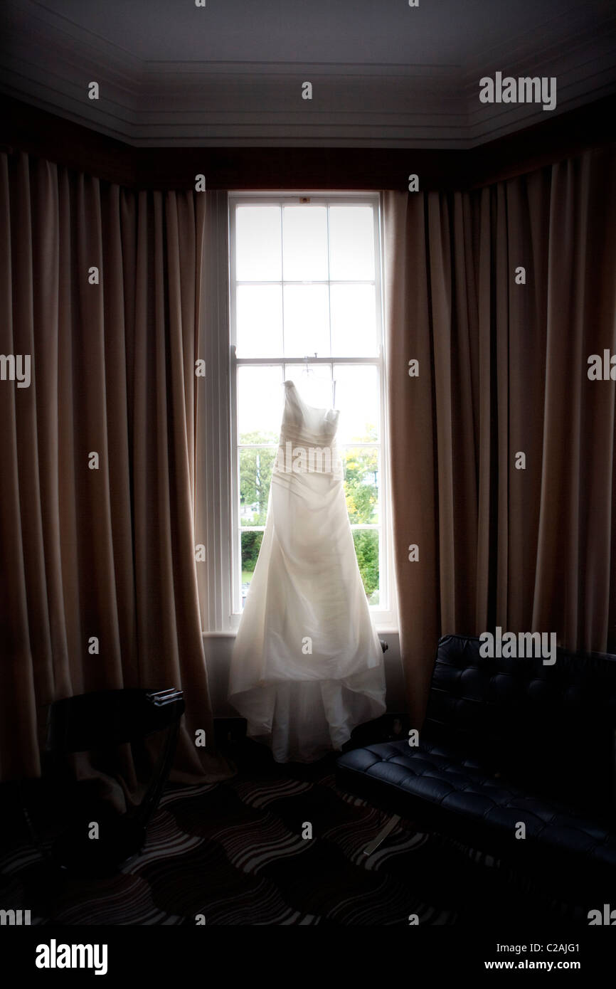 Wedding Dress in window Stock Photo - Alamy