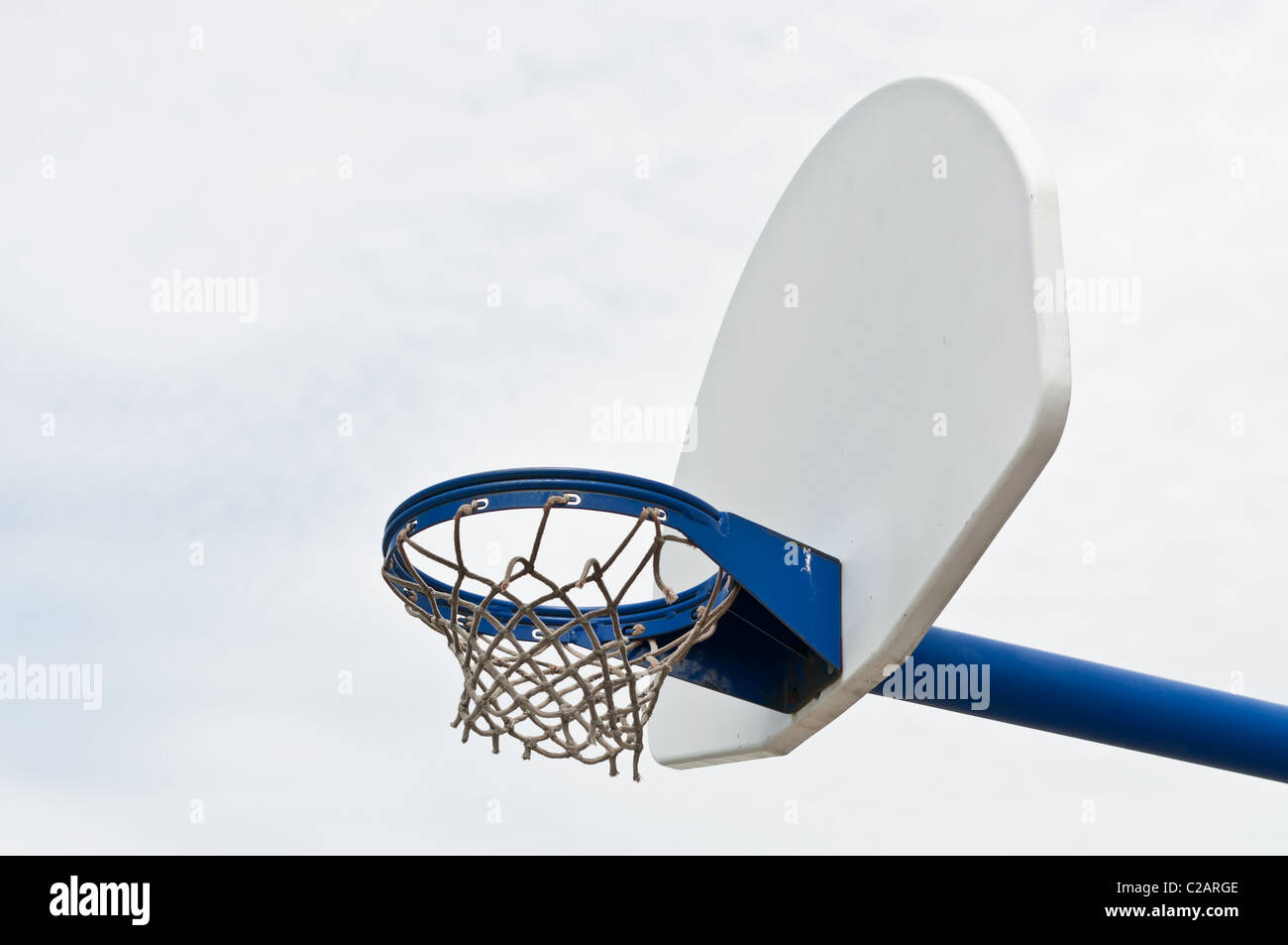 A basketball hoop and backboard in an outdoor playground Stock Photo ...