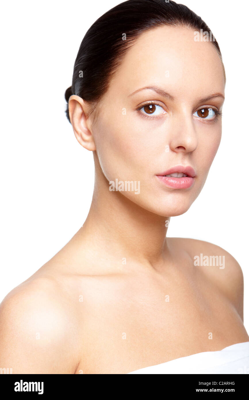 Gorgeous woman looking at camera over white background Stock Photo - Alamy