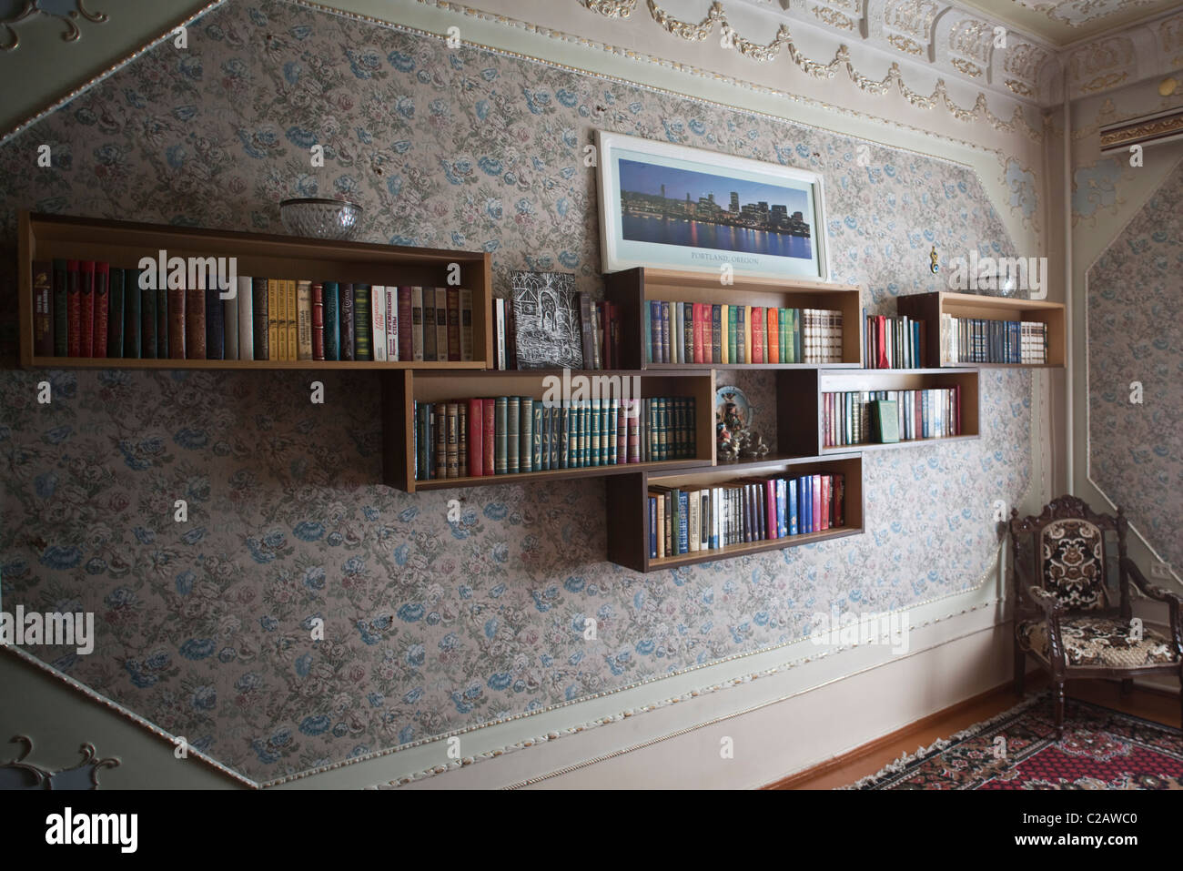 Interior of room with bookcases full of books hanging on wall Stock ...