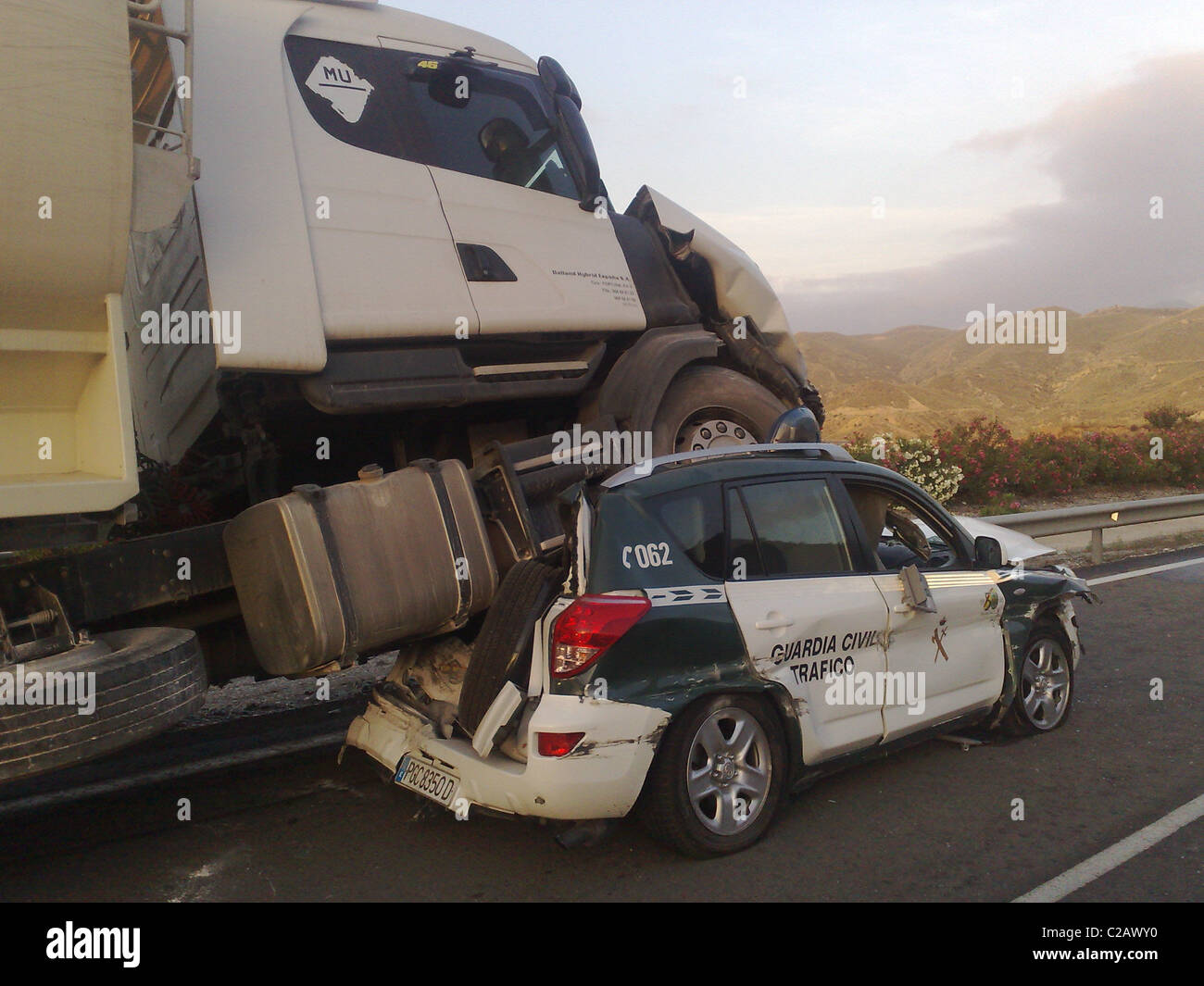 TRACTOR TRUCK V COP CAR A Toyota police car and its driver came out ...