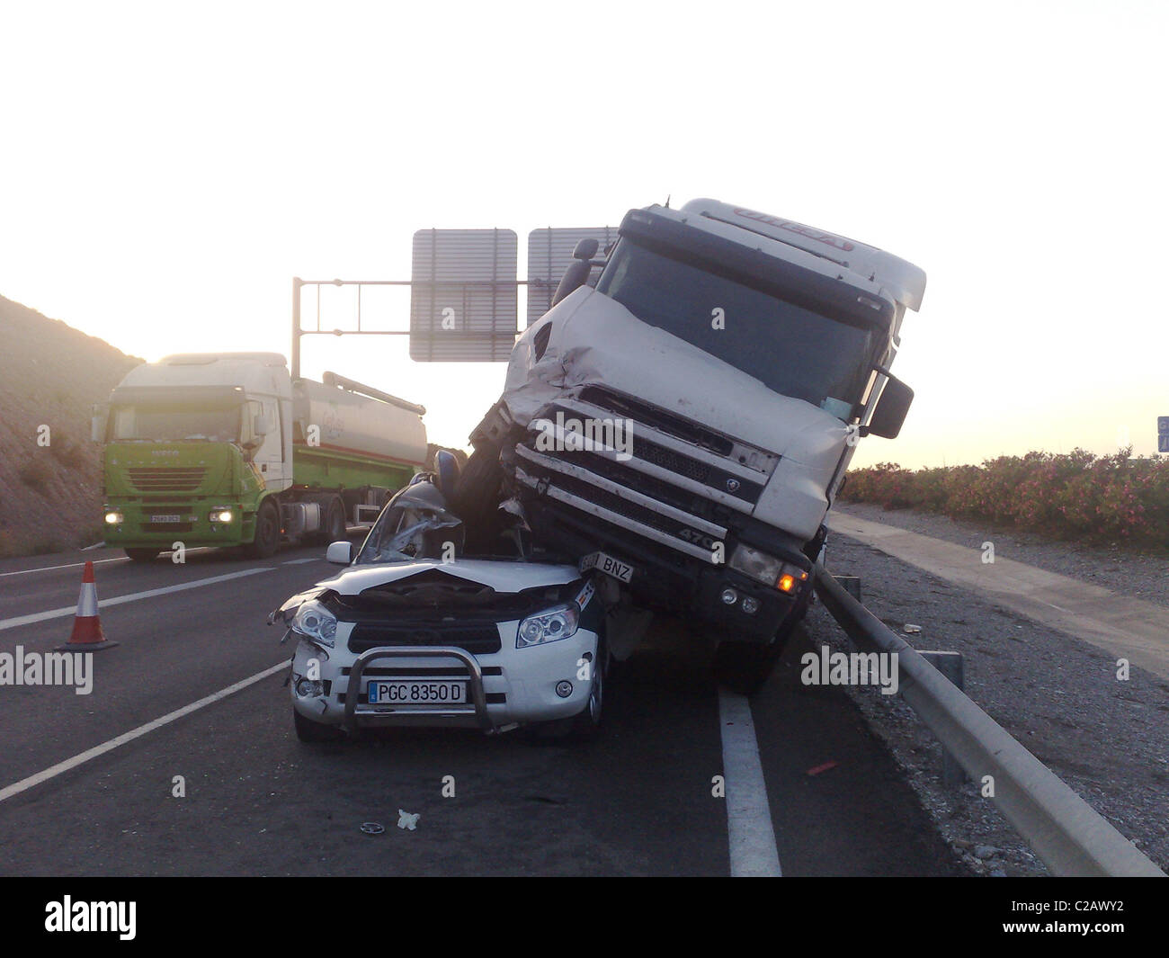 TRACTOR TRUCK V COP CAR A Toyota police car and its driver came out ...