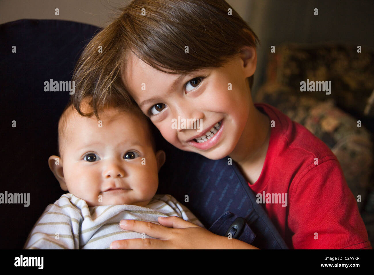Brother and his baby sibling, portrait Stock Photo - Alamy