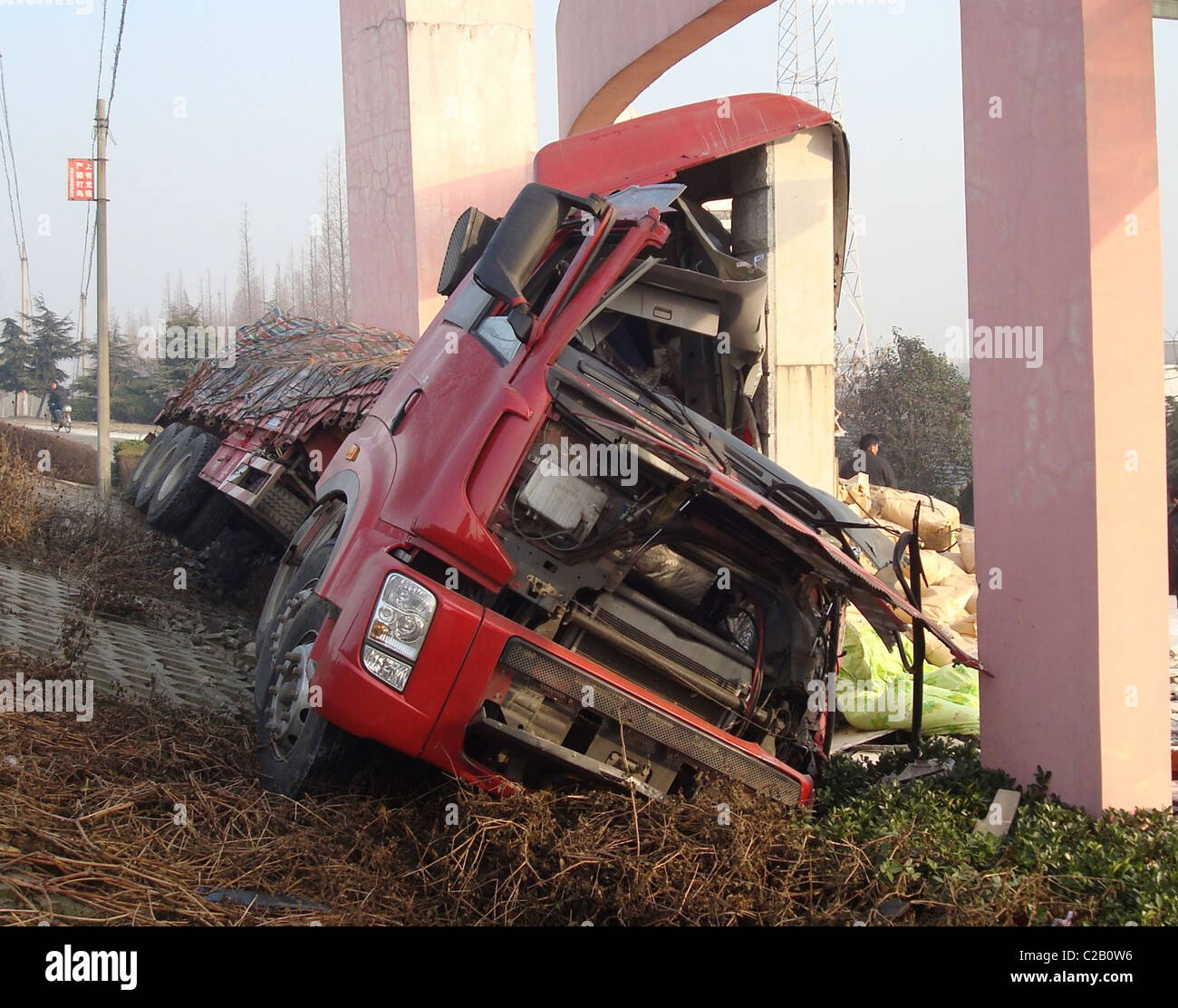 TRUCKER SURVIVES HORROR CRASH A terrified lorry driver survived a brush ...