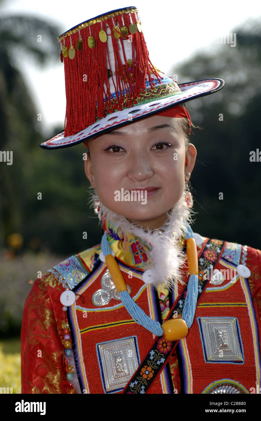 Qian Weili of the Yugu ethnic minority displaying her folk costume in ...