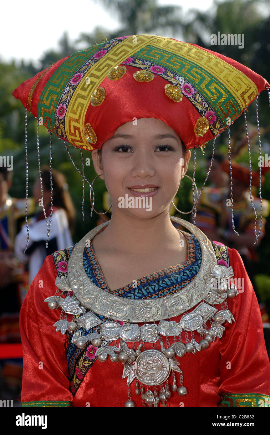 Nong Shuping of the Zhuang ethnic minority displaying her folk costumes ...
