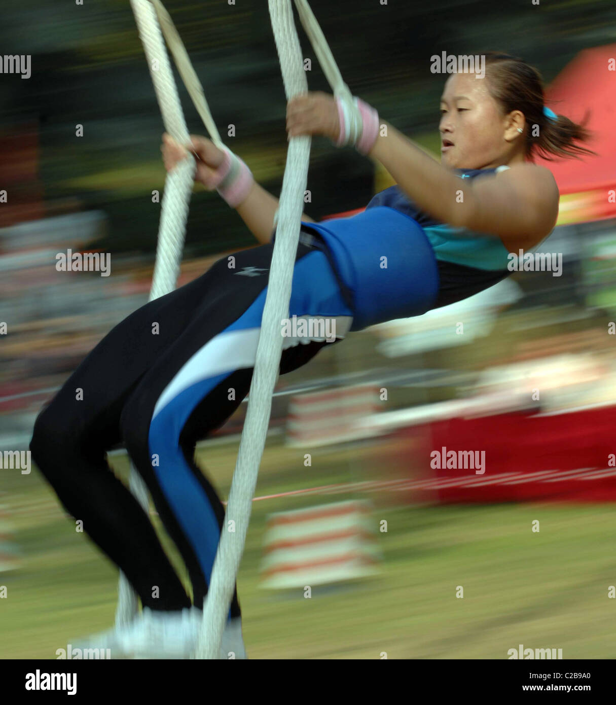 China: Wu Anzhen of the Miao ethnic group of Hunan team competes at 55 ...