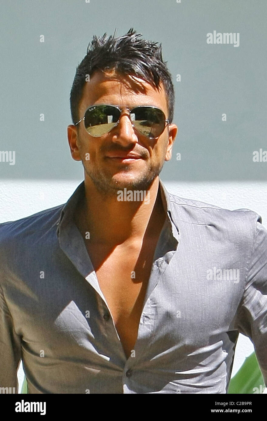 Peter Andre taking part in a photoshoot outside his house Sussex ...