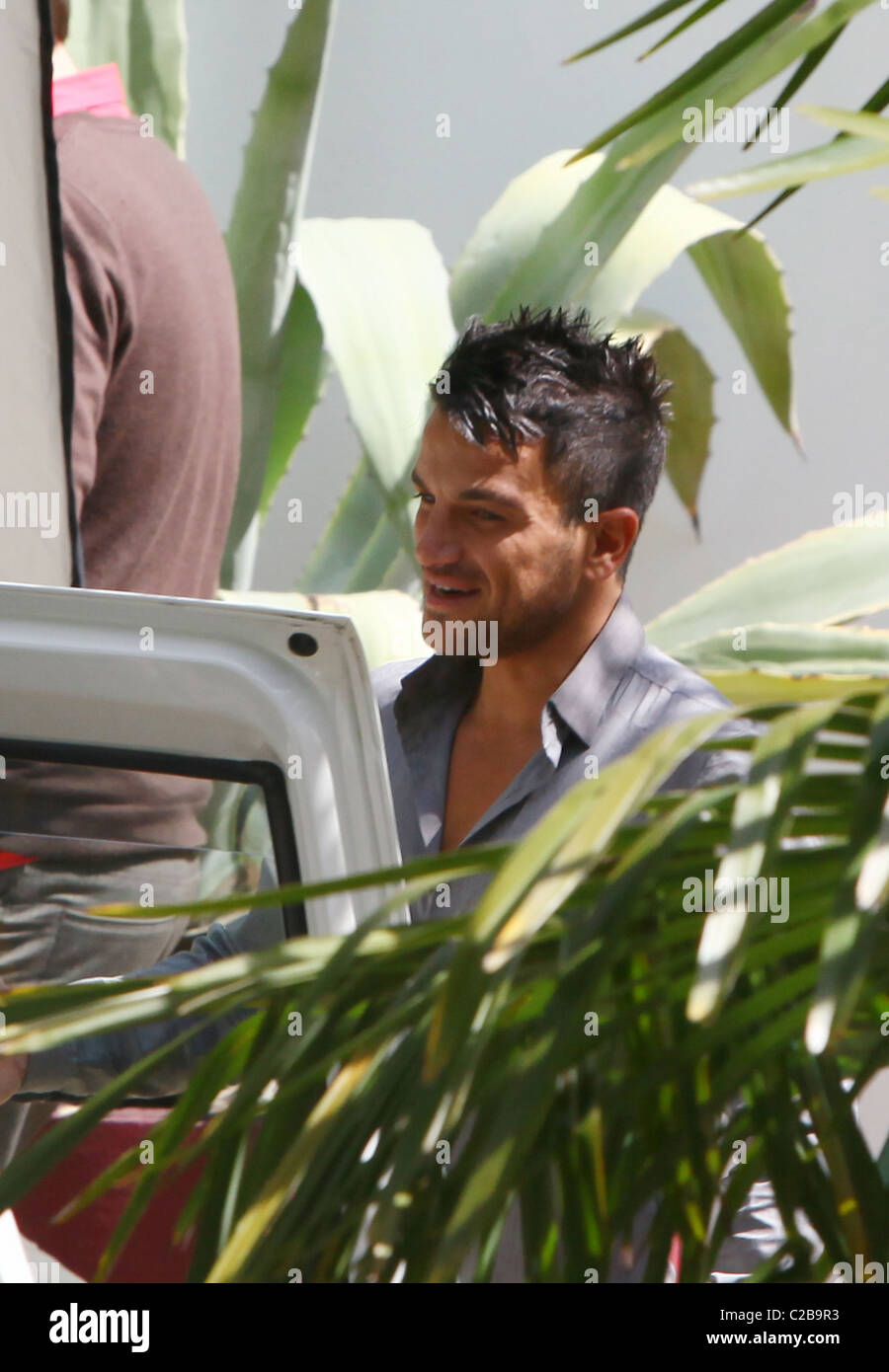 Peter Andre taking part in a photoshoot outside his house Sussex ...