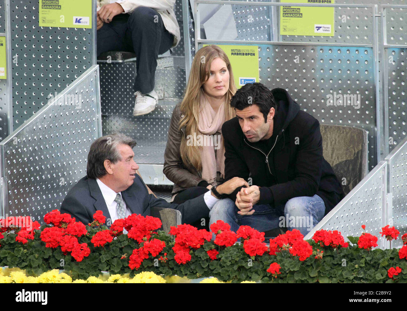 Louis Figo (R) and his wife Helen Swedin at the Madrid Masters Open ...