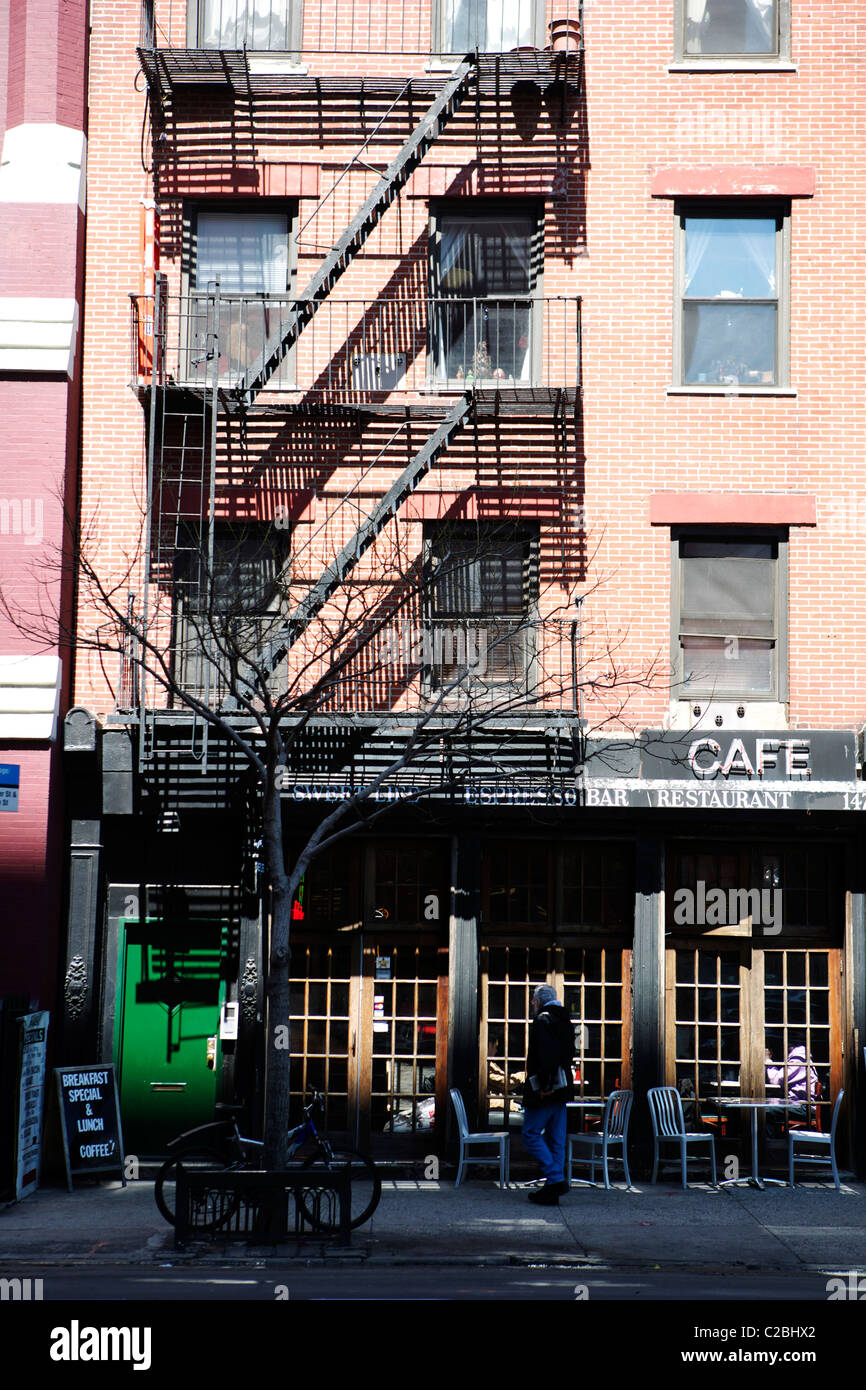 A cafe at ground level with residential apartments above and fire ...