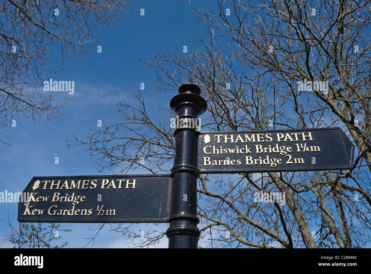thames path signpost in kew, southwest london, giving local directions ...