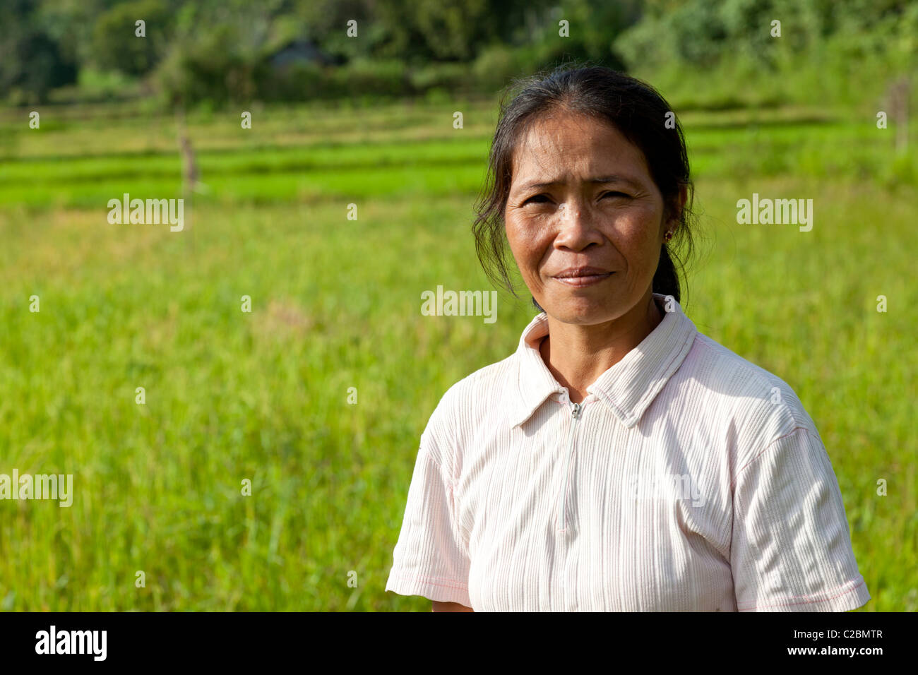 Portrait of a Filipino woman in a field Stock Photo - Alamy