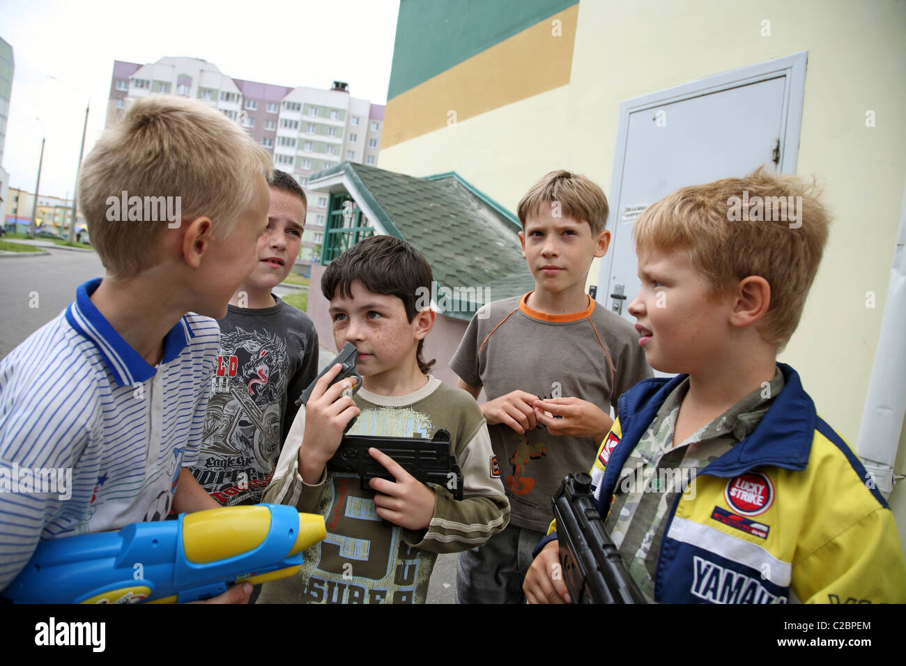 Children playing war in a housing estate, Hrodna, Belarus Stock Photo ...