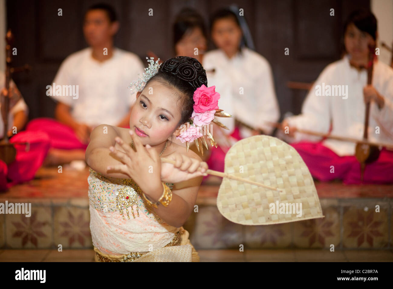 High school girl dancing traditional style at the Kong Ta market street ...