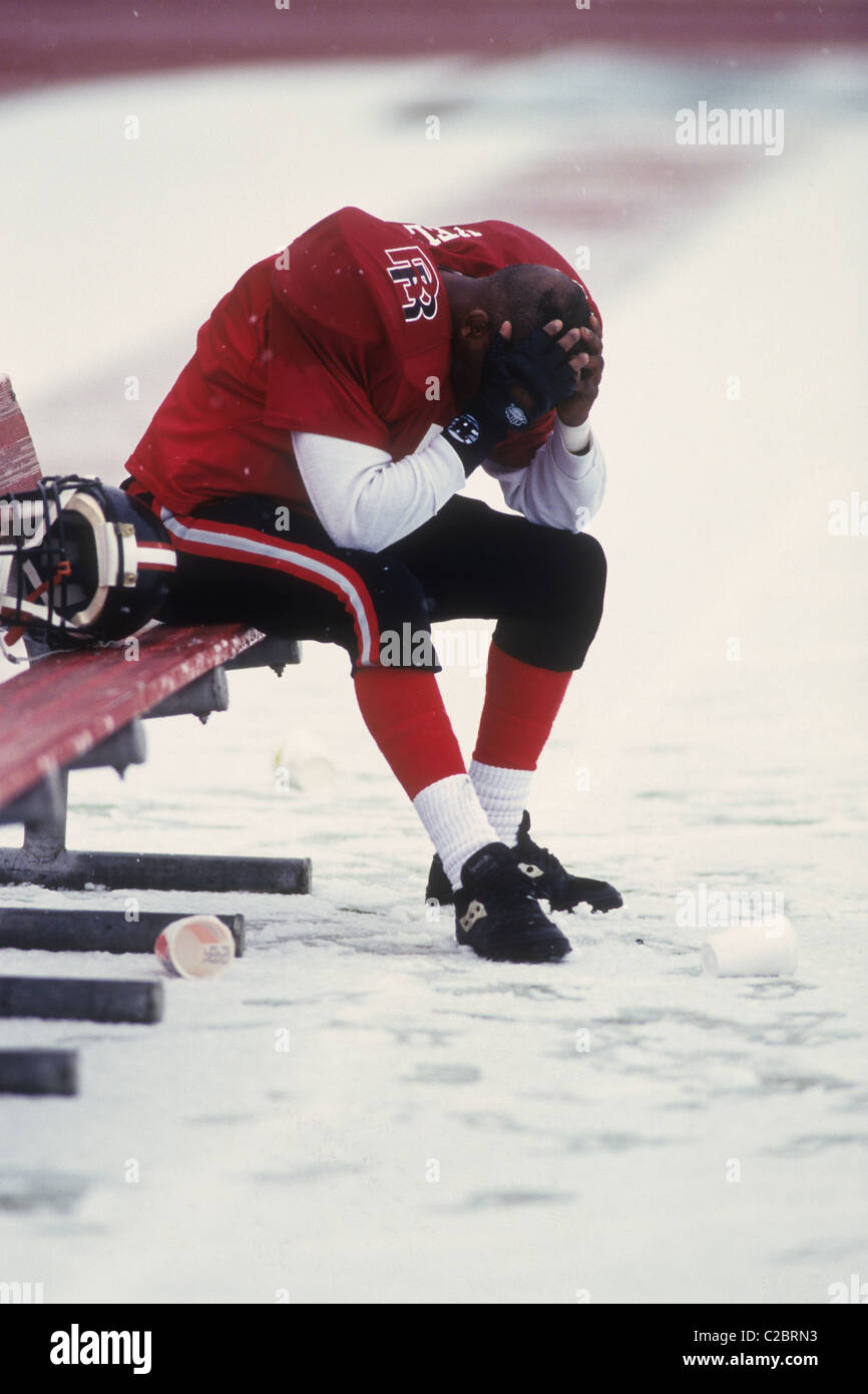 American football player on the bench Stock Photo - Alamy