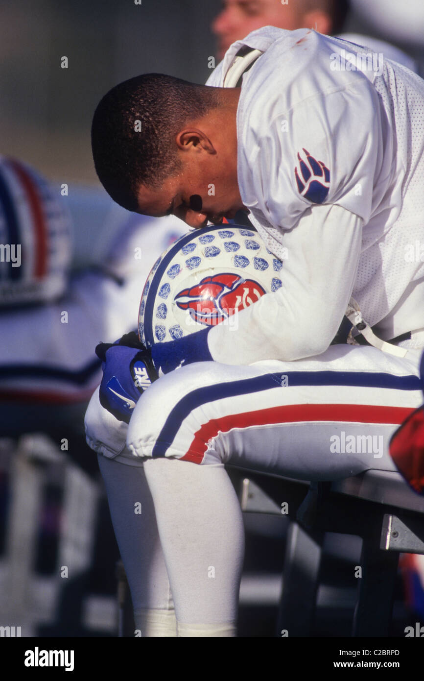 American football player on the bench Stock Photo - Alamy