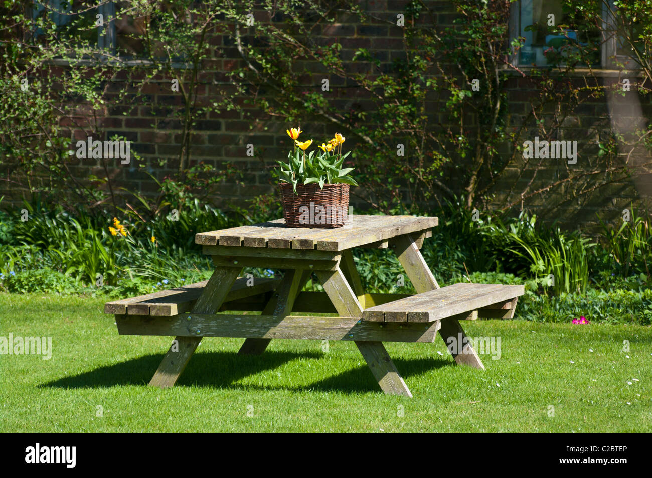 Wooden Garden Table and Benches Stock Photo - Alamy