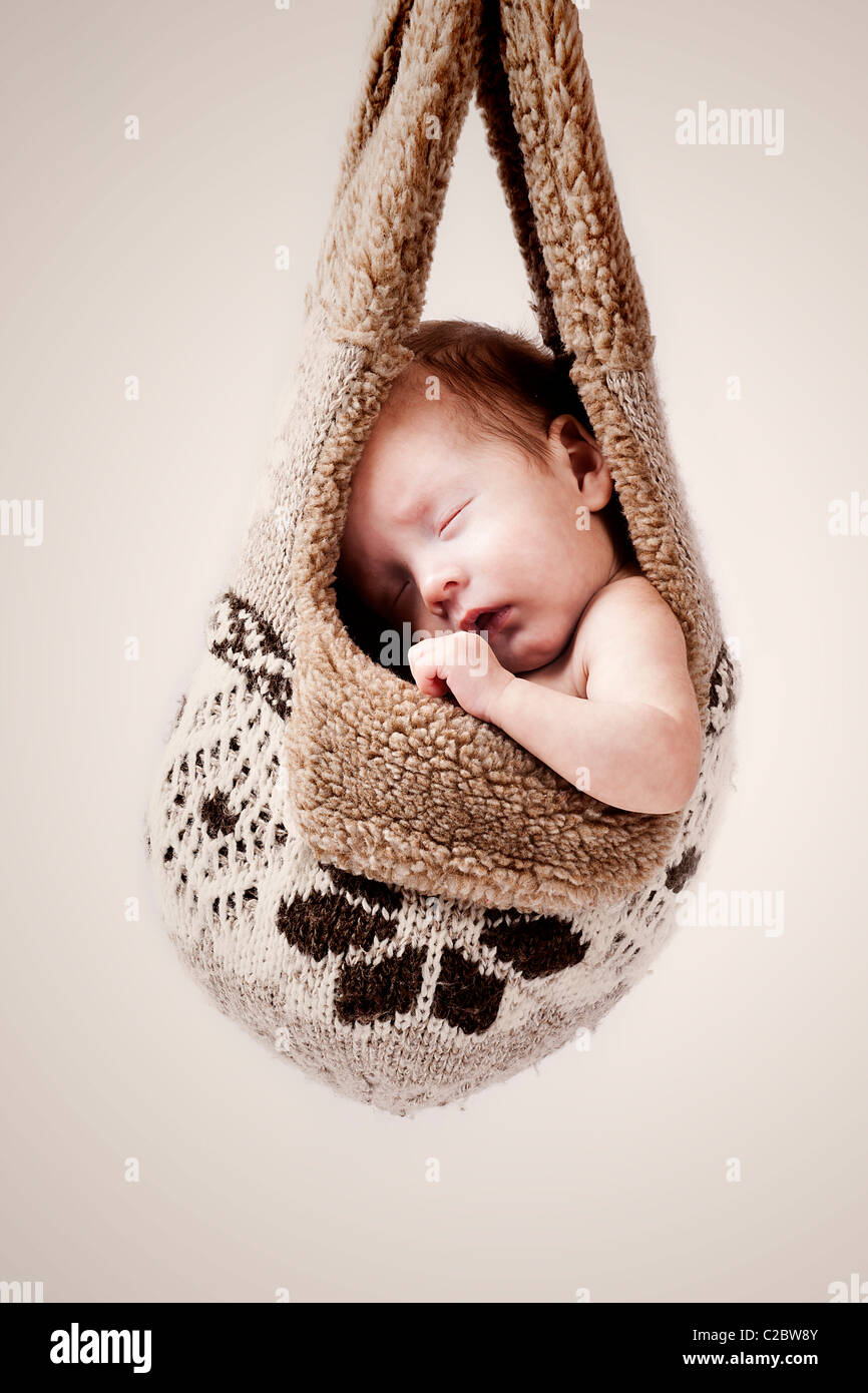 little baby sleeping in the hat Stock Photo - Alamy