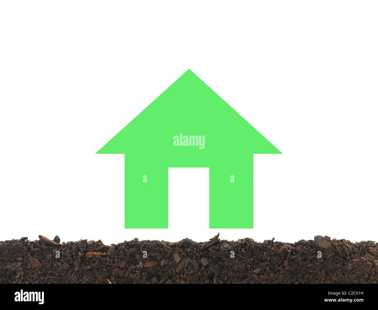 Garden soil with a symbol of a house isolated against a white ...